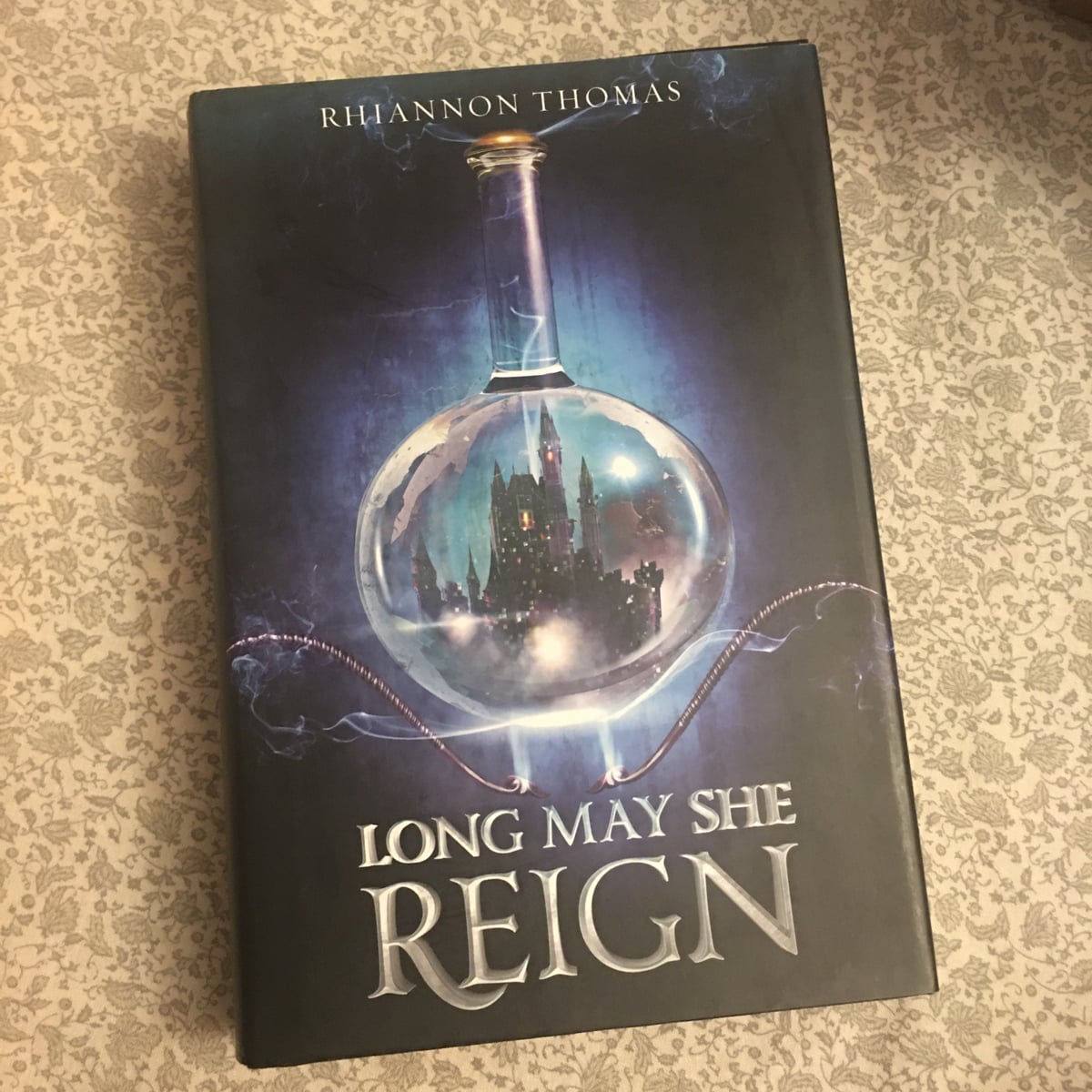 Long May She Reign by Rhiannon Thomas