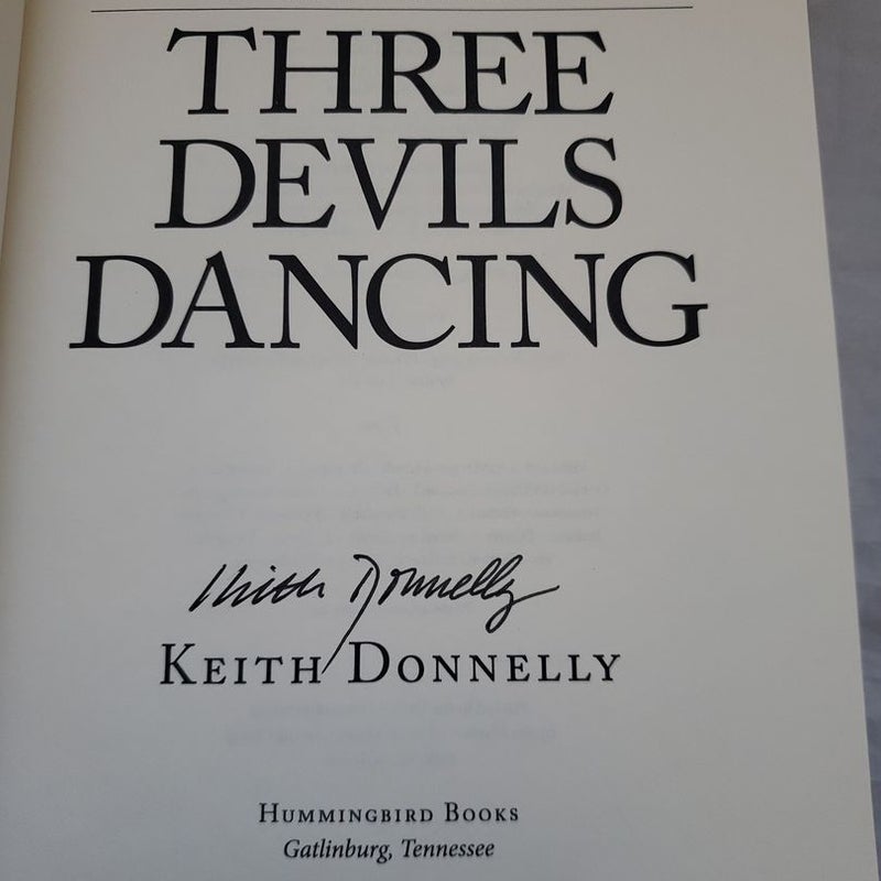 Three Devils Dancing by Keith Donnelly, Hardcover | Pangobooks