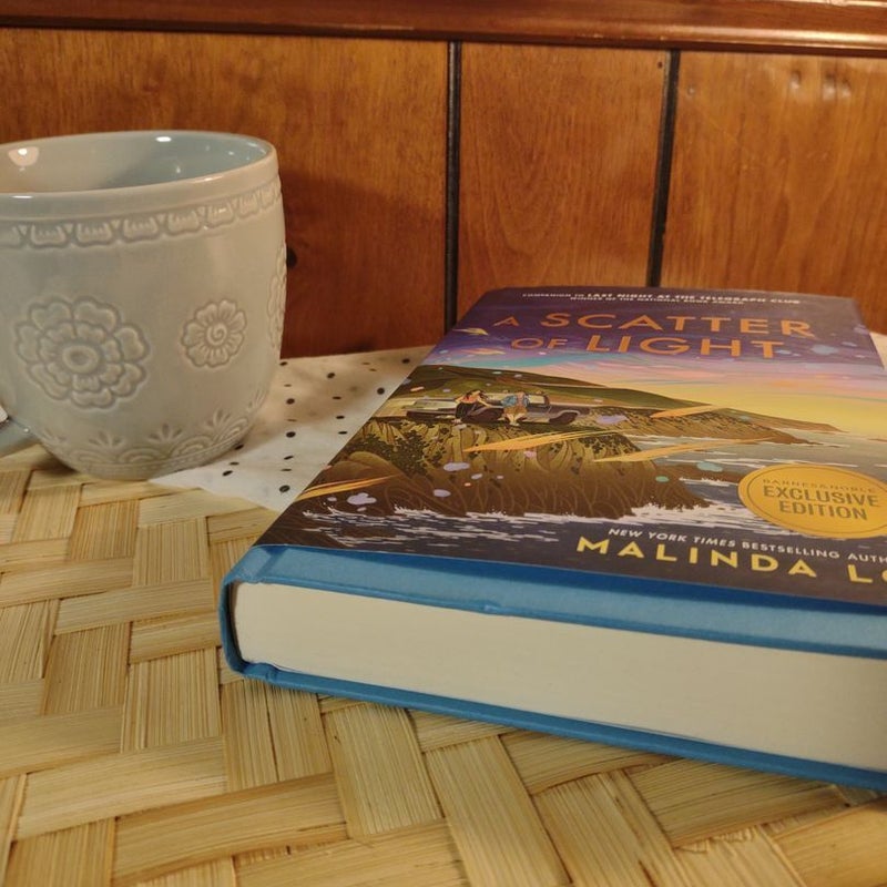 A scatter of light by Malinda Lo, Hardcover | Pangobooks