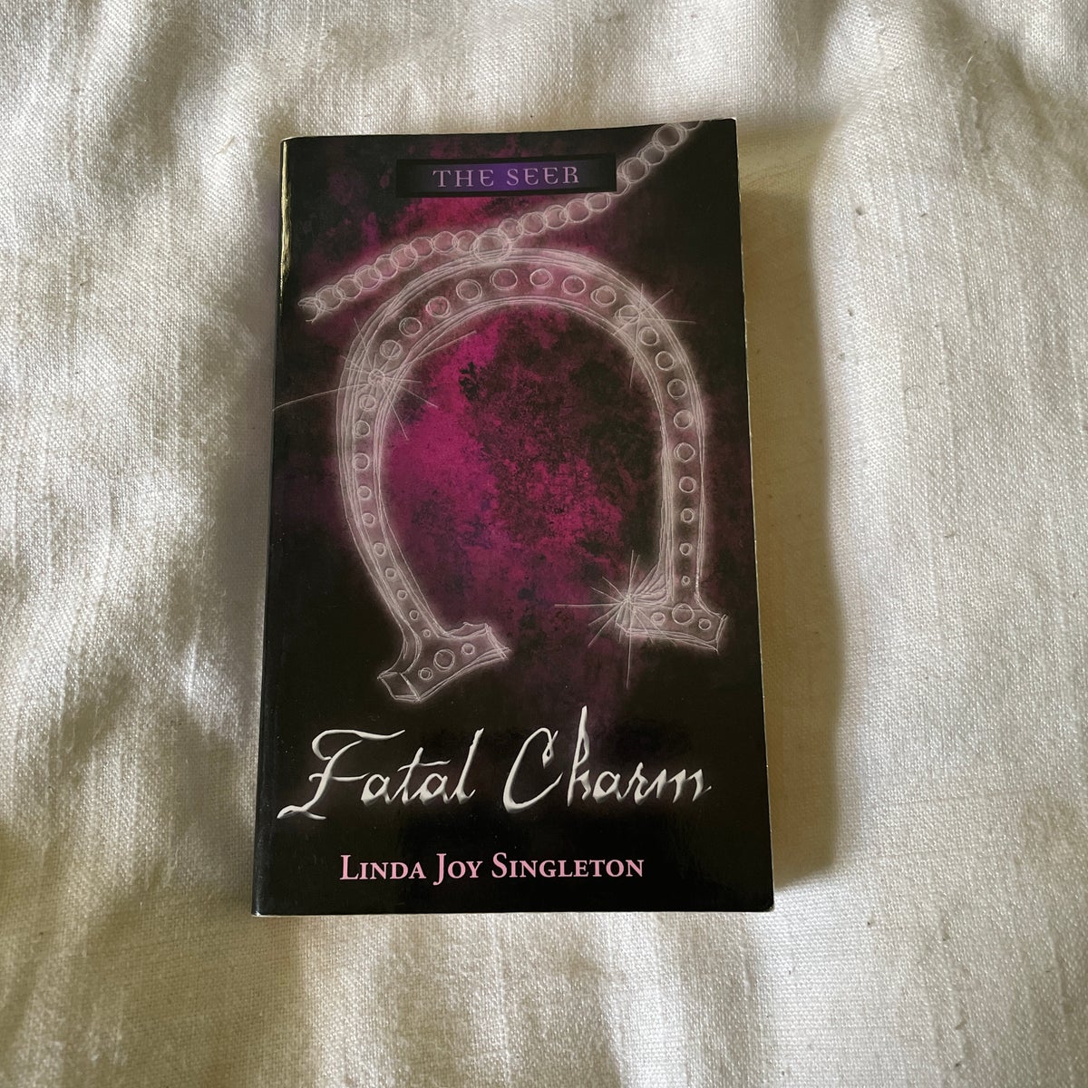 Fatal Charm by Linda Joy Singleton
