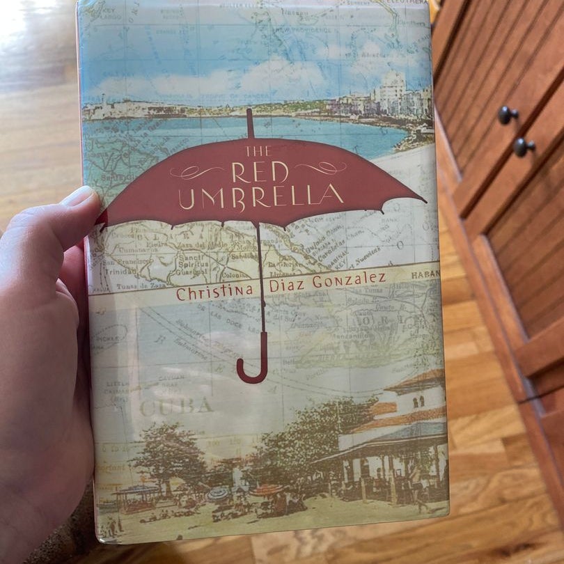 The Red Umbrella by Christina Diaz Gonzalez