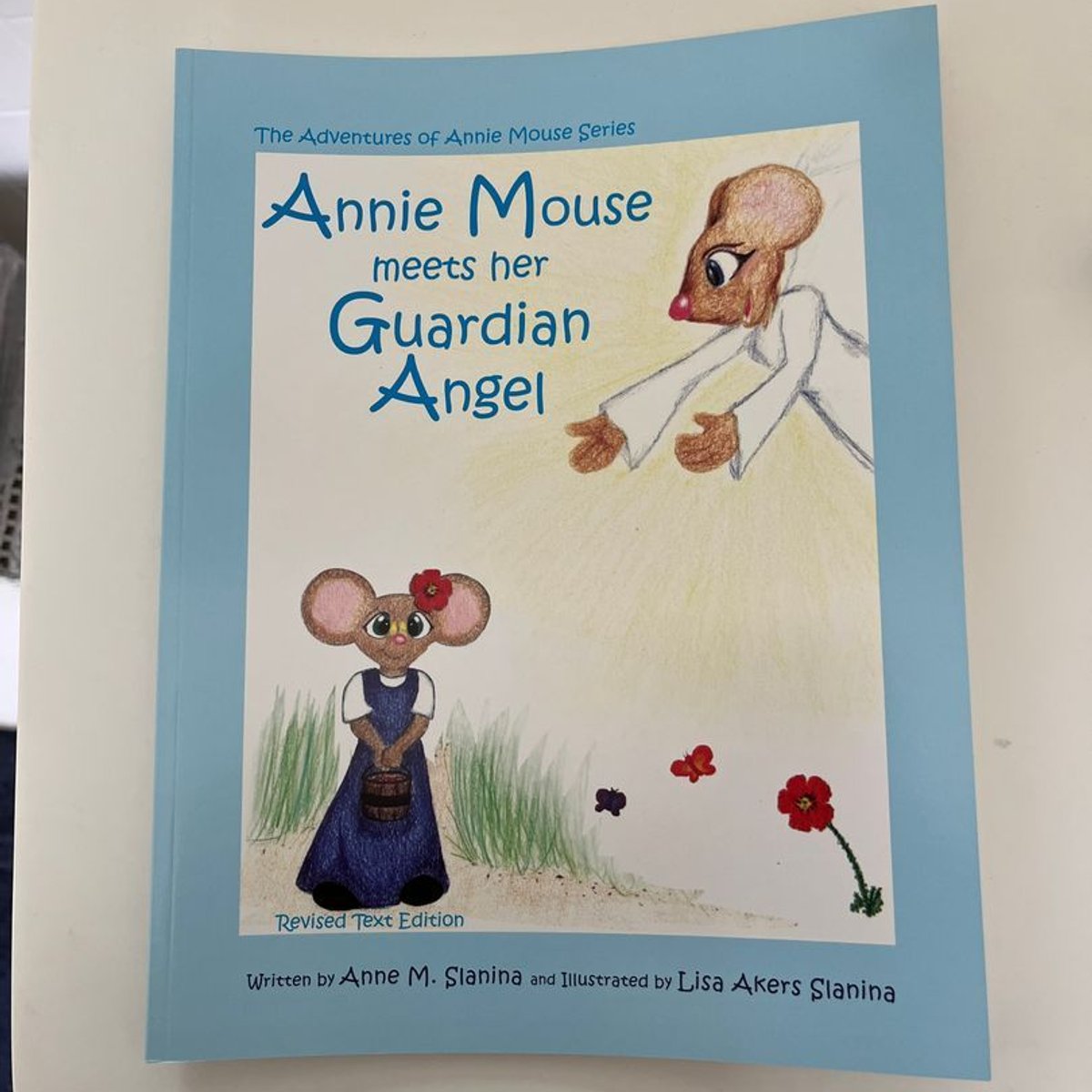 Annie Mouse Meets Her Guardian Angel by Anne M. Slanina