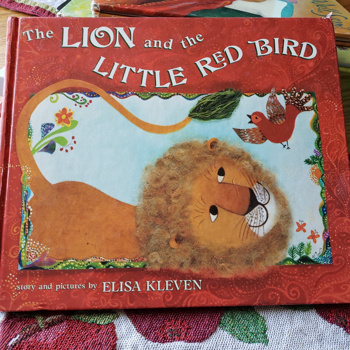 The Lion and the Little Red Bird by Elisa Kleven