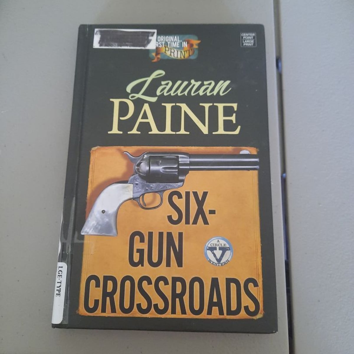 Six-Gun Crossroads by Lauran Paine