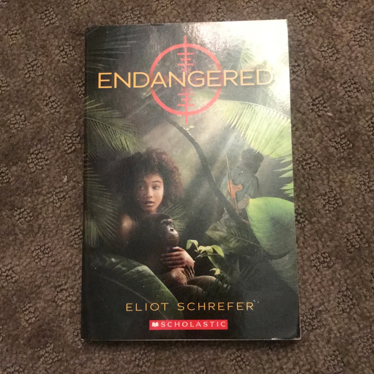 Endangered by Eliot Schrefer , Paperback | Pangobooks