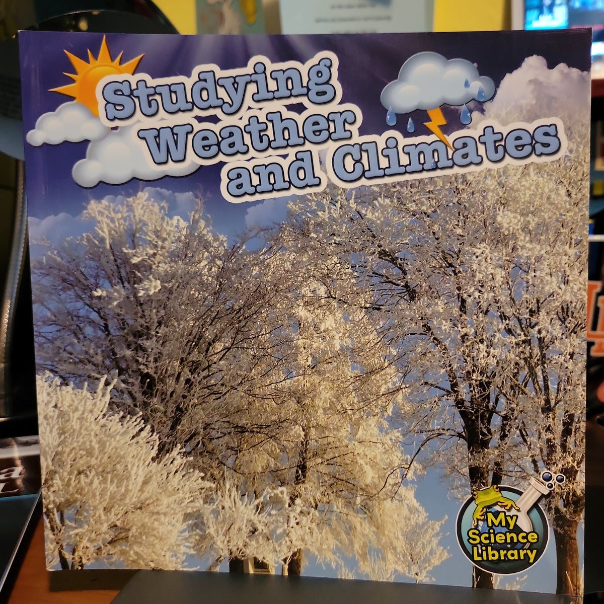 Studying Weather and Climates by Conrad J. Storad