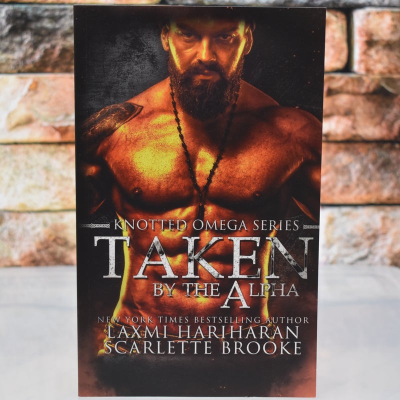 Taken by the Alpha by Laxmi Hariharan & Scarlett Brooke, Paperback | Pangobooks