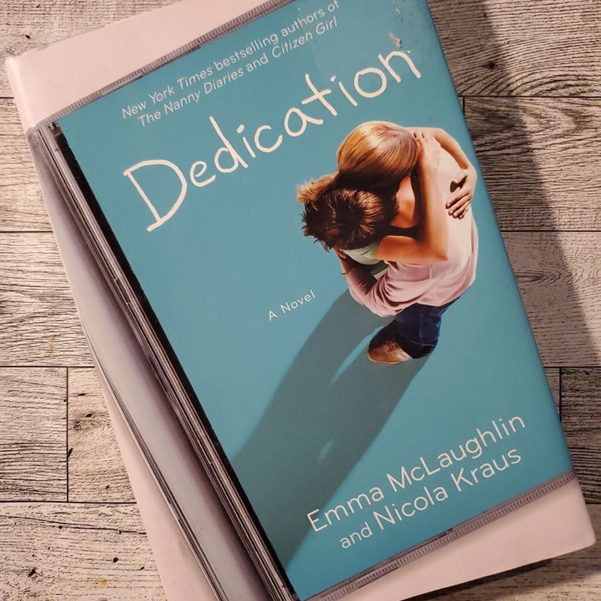 Dedication by Emma McLaughlin, Nicola Kraus