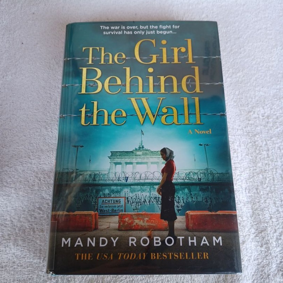 The Girl Behind the Wall by Mandy Robotham