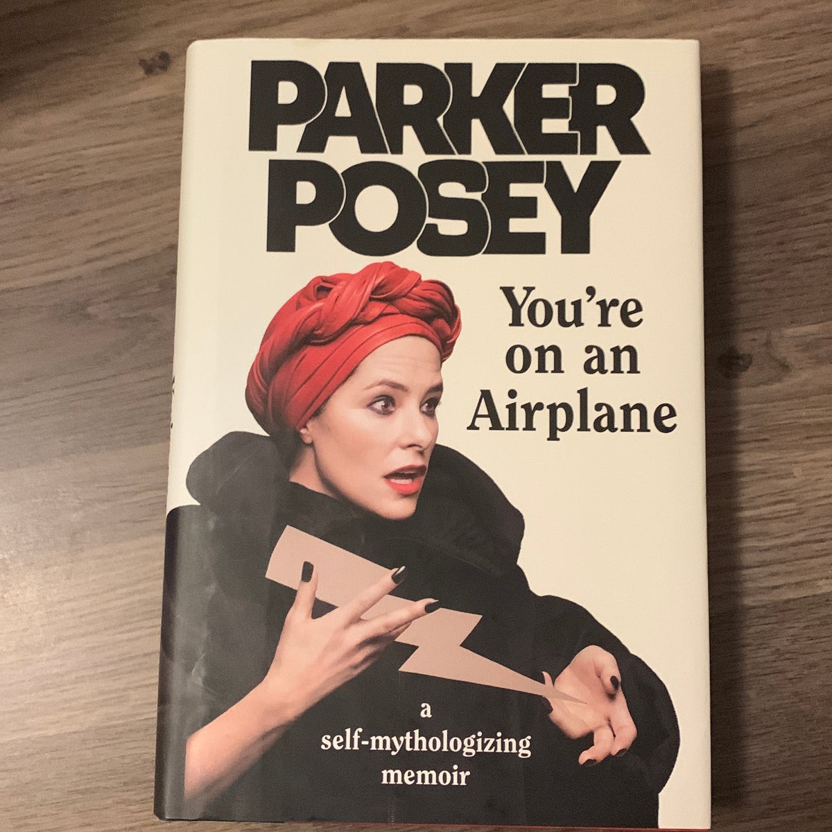 You're on an Airplane by Parker Posey