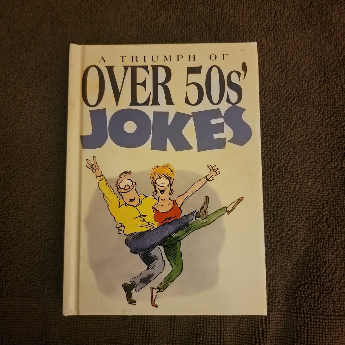 A Triumph of over 50's Jokes by Bill Stott, Helen Exley