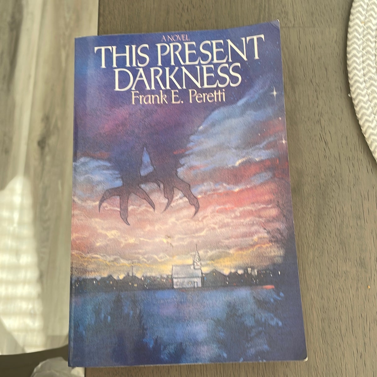 This Present Darkness by Frank E. Peretti, Paperback | Pangobooks
