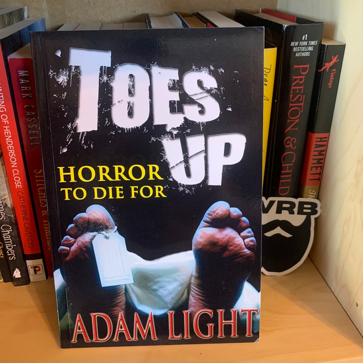 Toes Up by Adam Light