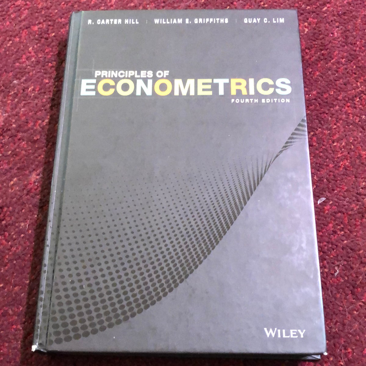 Principles of Econometrics by R. Carter Hill, R. Carter Hill, William E. Griffiths, Guay C. Lim