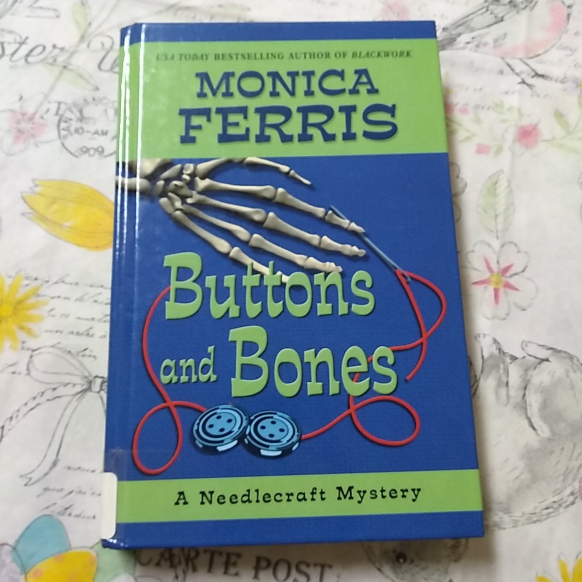Buttons and Bones by Monica Ferris