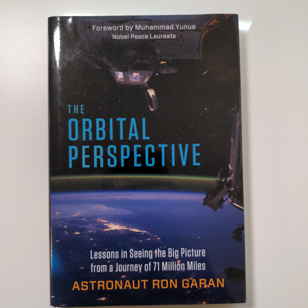 The Orbital Perspective by Ron Garan, Muhammad Yunus