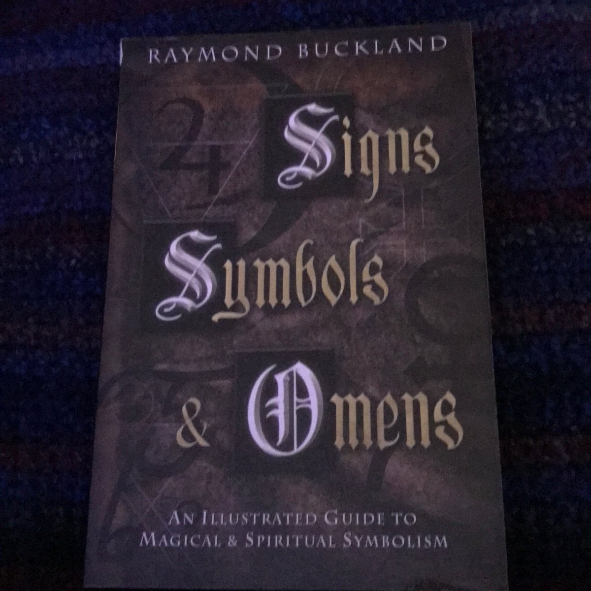 Signs, Symbols and Omens by Raymond Buckland