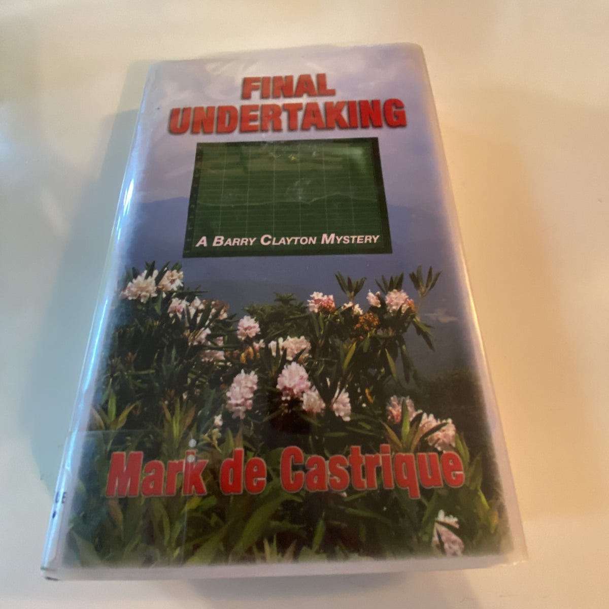 Final Undertaking by Mark de Castrique, Hardcover | Pangobooks