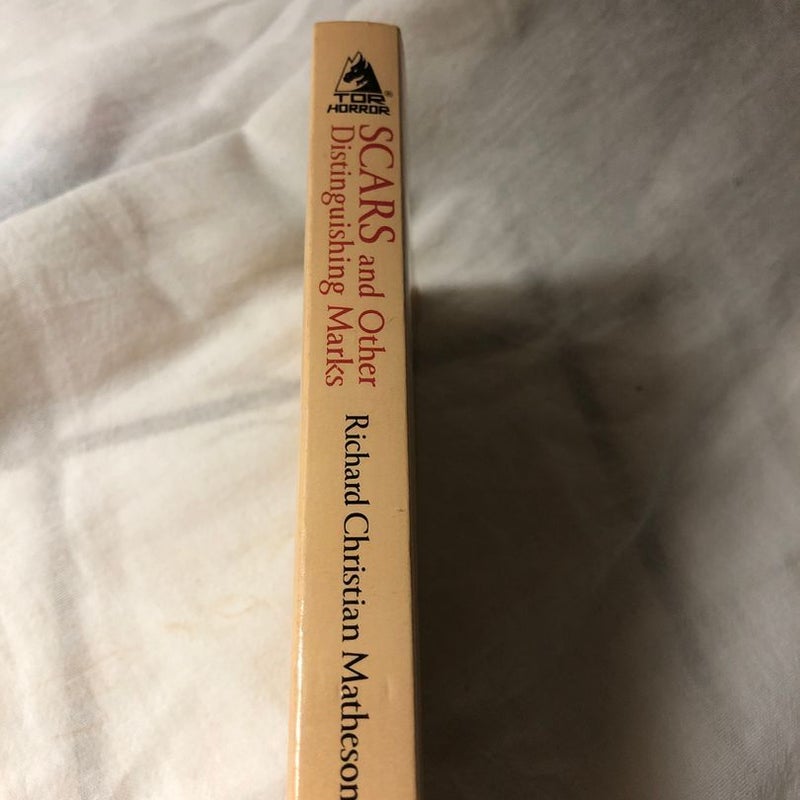 Scars and Other Distinguishing Marks