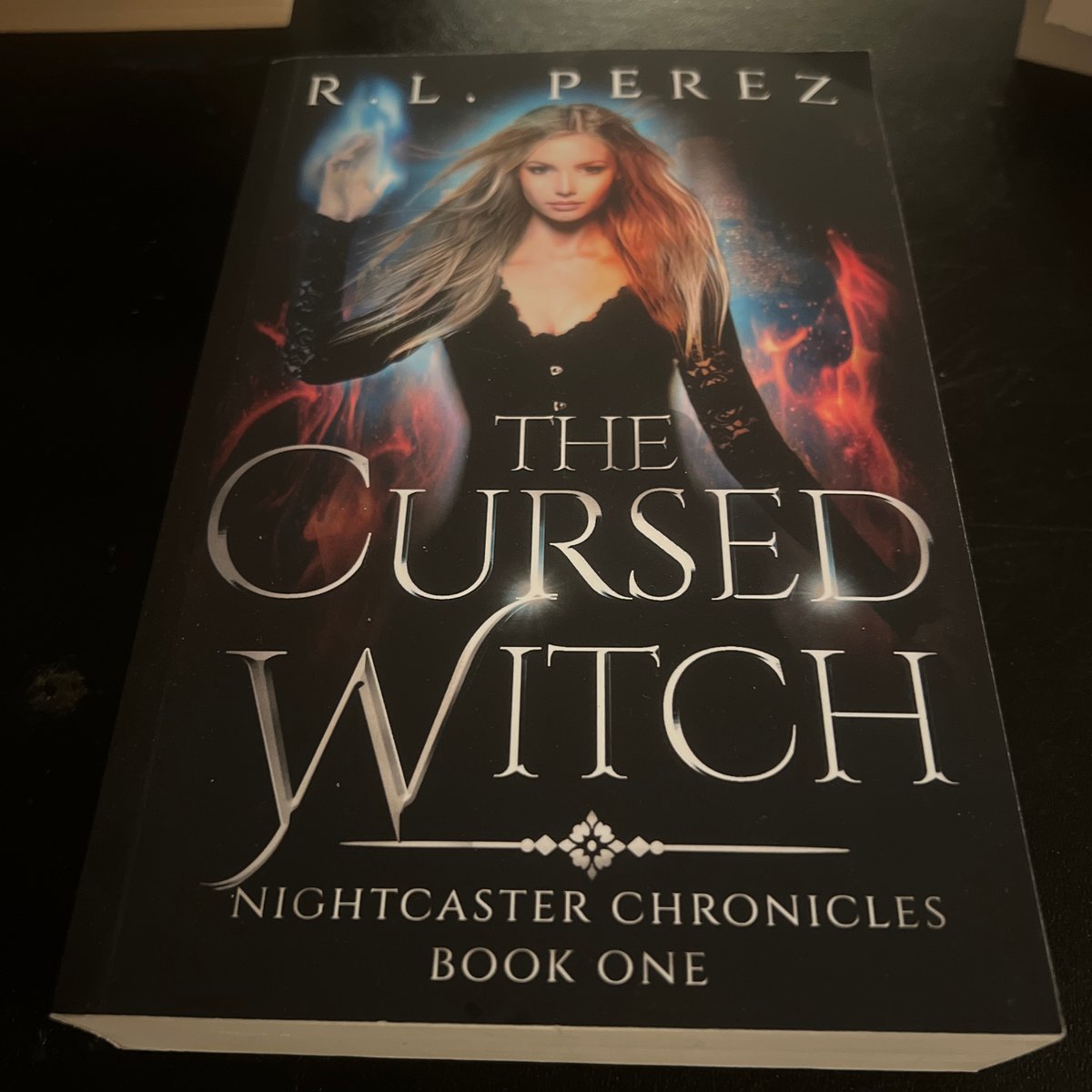The Cursed Witch by R. L. Perez