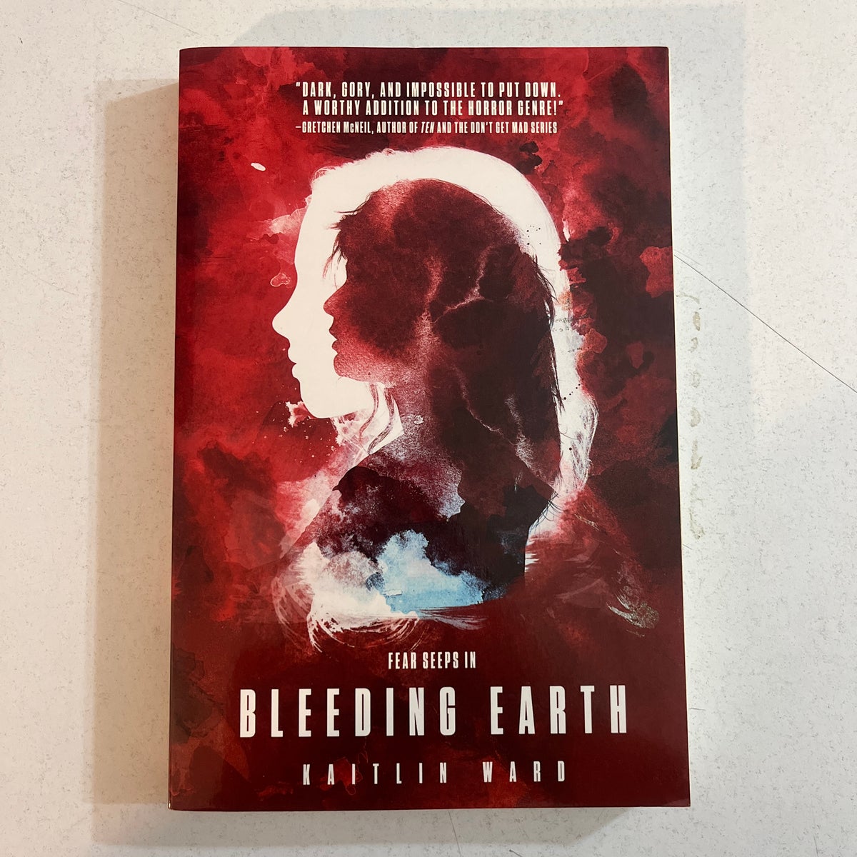 Bleeding Earth by Kaitlin Ward, Paperback | Pangobooks