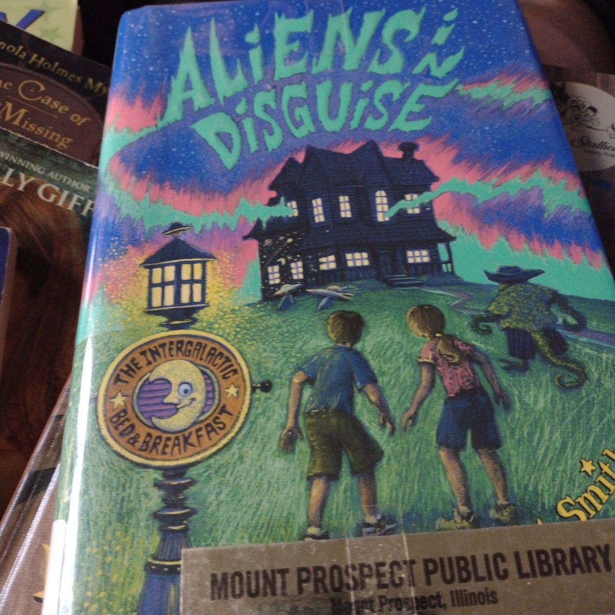 Aliens in Disguise by Clete Barrett Smith