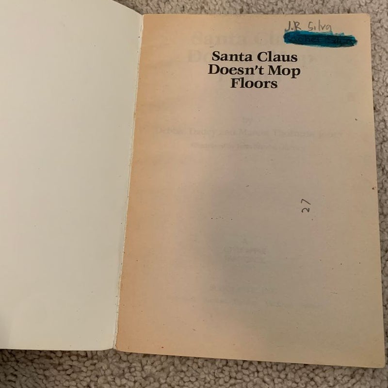 Santa Claus Doesn't Mop Floors by Debbie Dadey, Paperback | Pangobooks