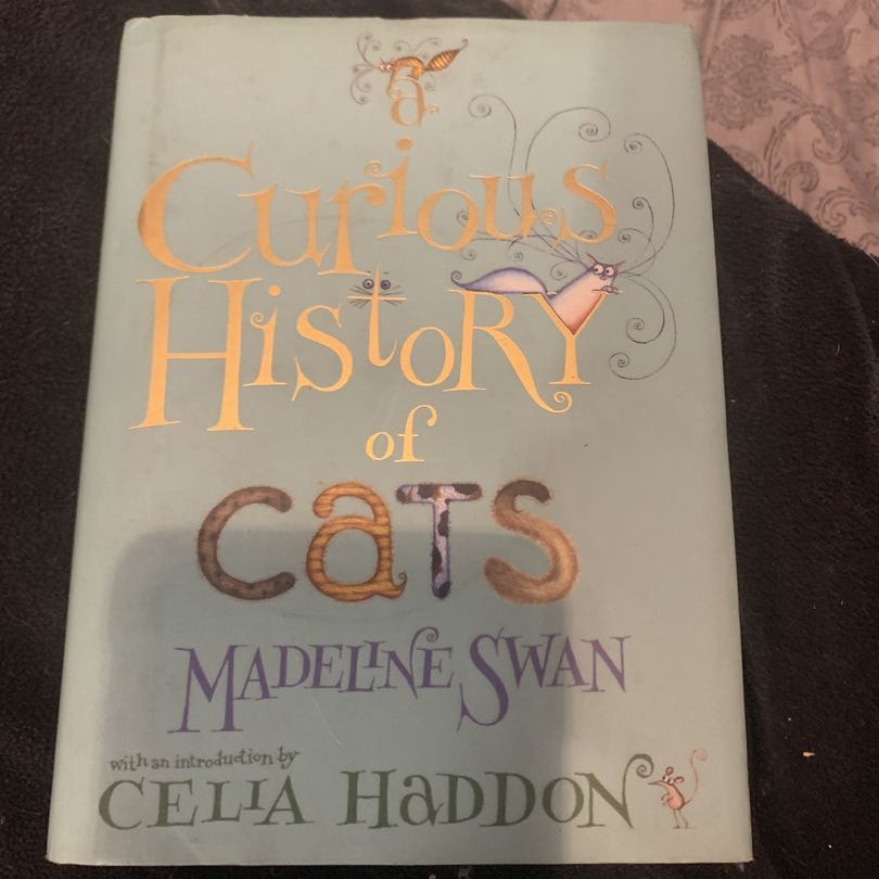 A Curious History of Cats by Madeline Swan, Celia Haddon