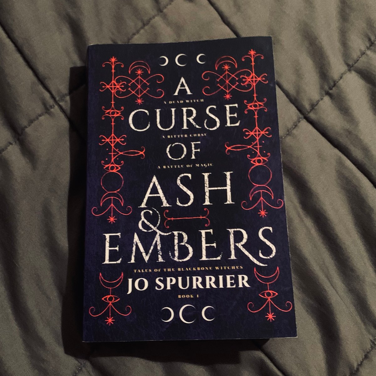 A Curse of Ash and Embers by Jo Spurrier