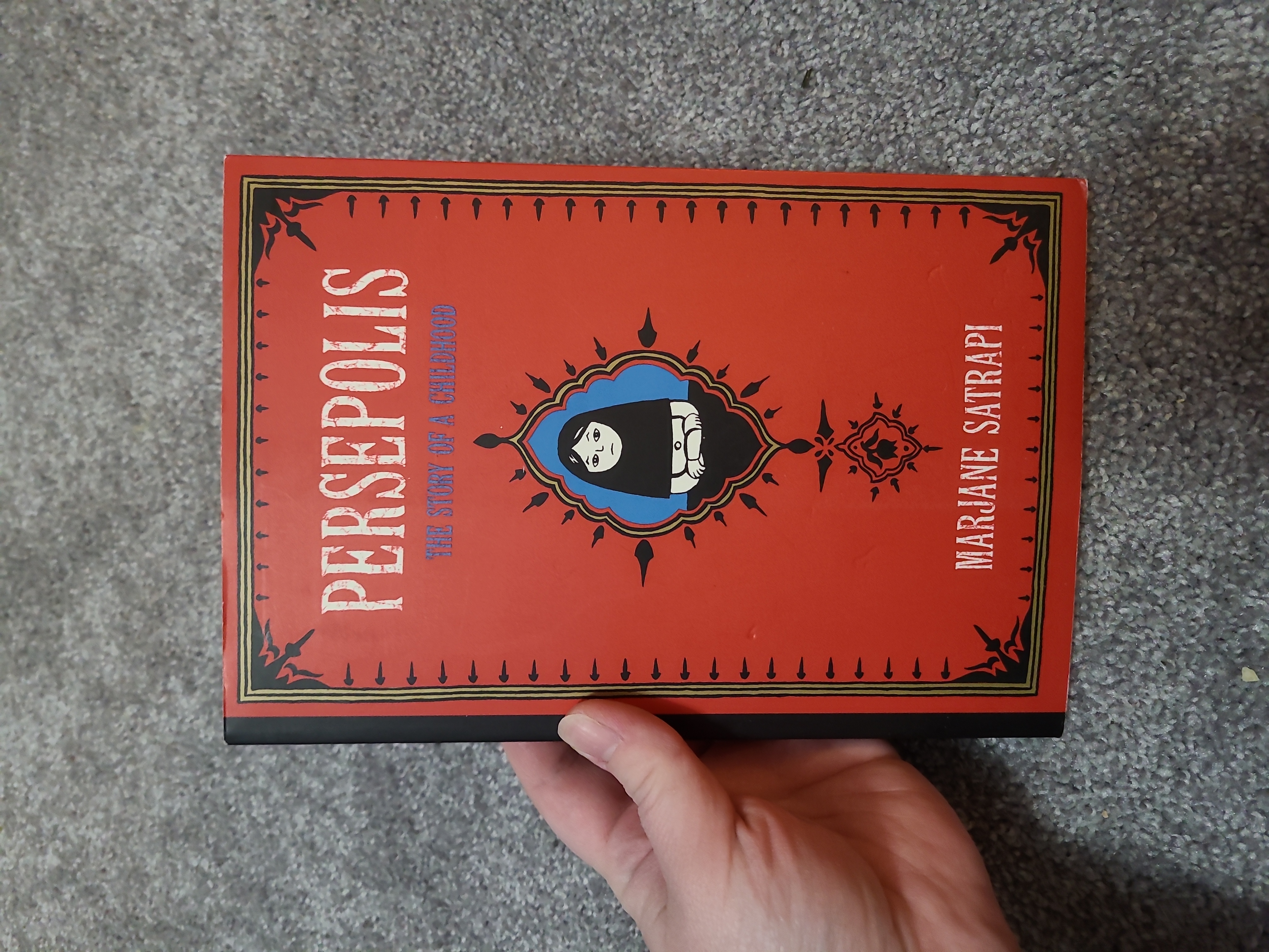 Persepolis by Marjane Satrapi