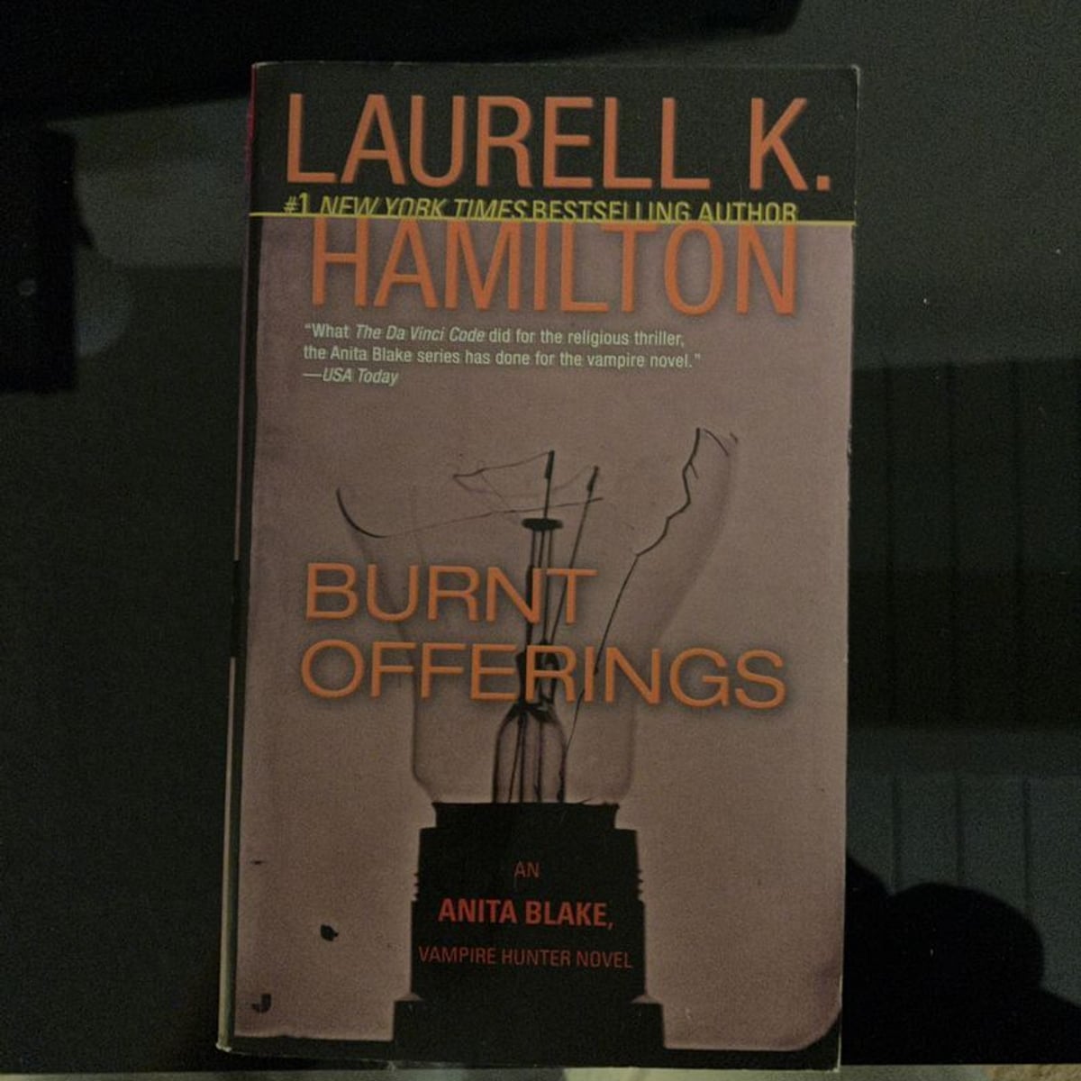 Burnt Offerings by Laurell K. Hamilton