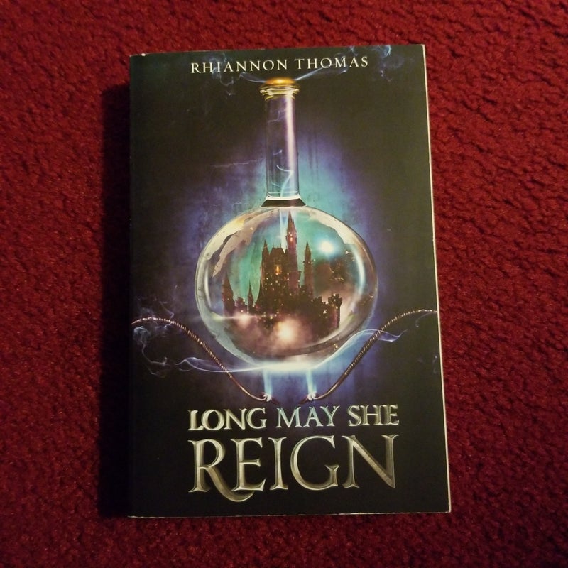 Long May She Reign by Rhiannon Thomas, Paperback | Pangobooks