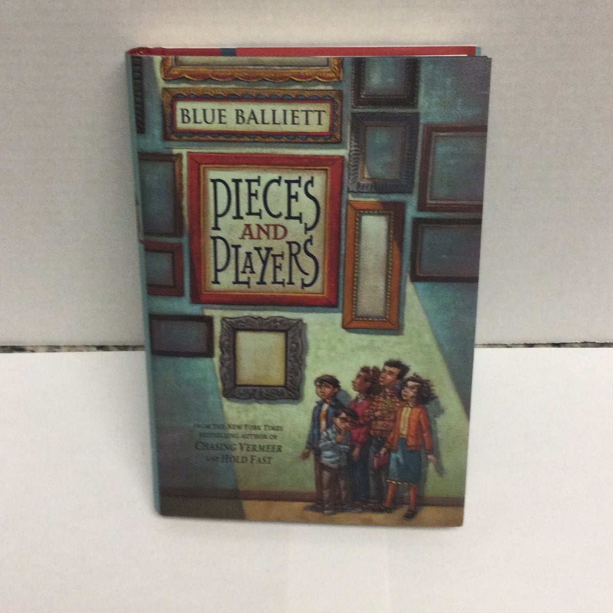 Pieces and Players by Blue Balliett