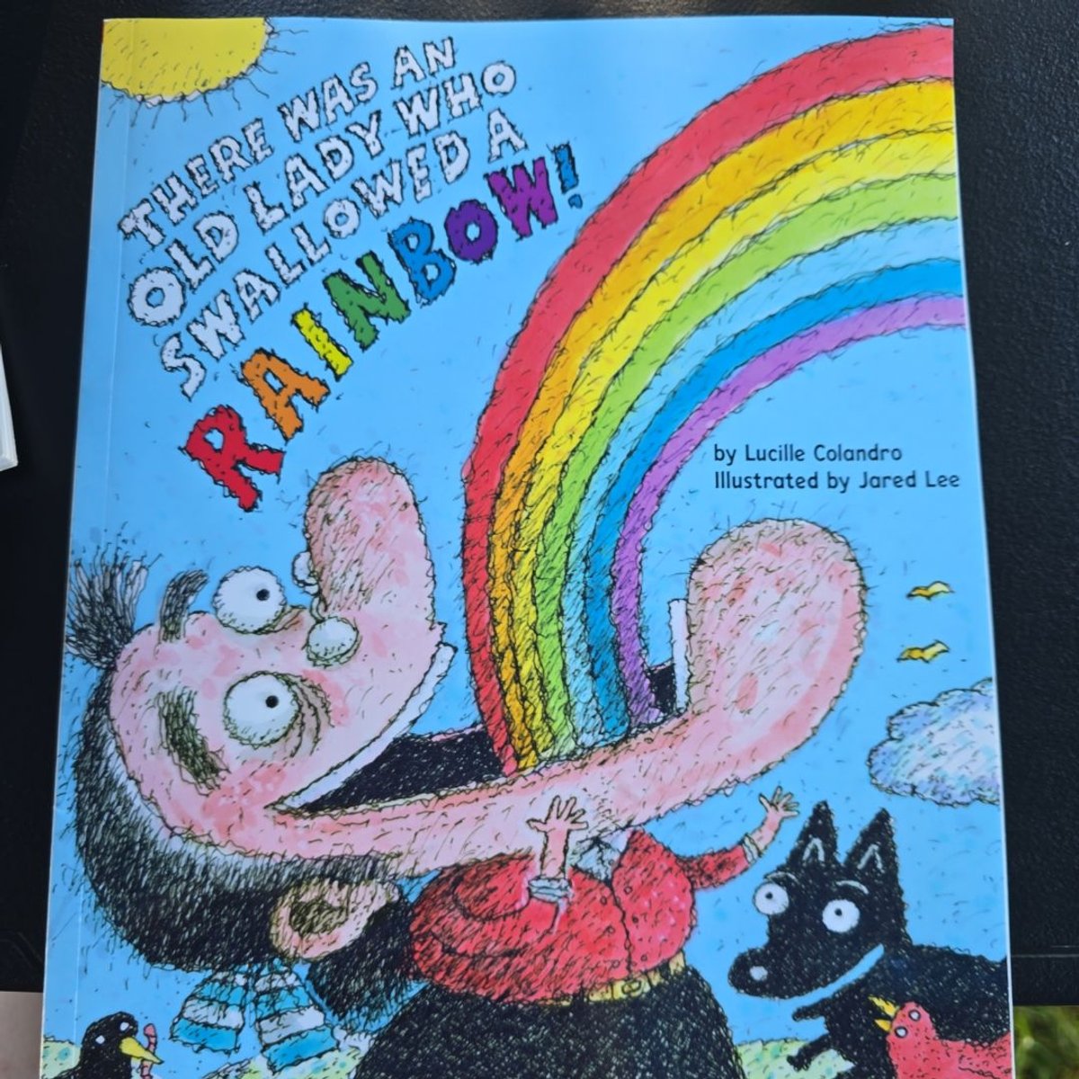 There Was an Old Lady Who Swallowed a Rainbow! by Lucille Colandro