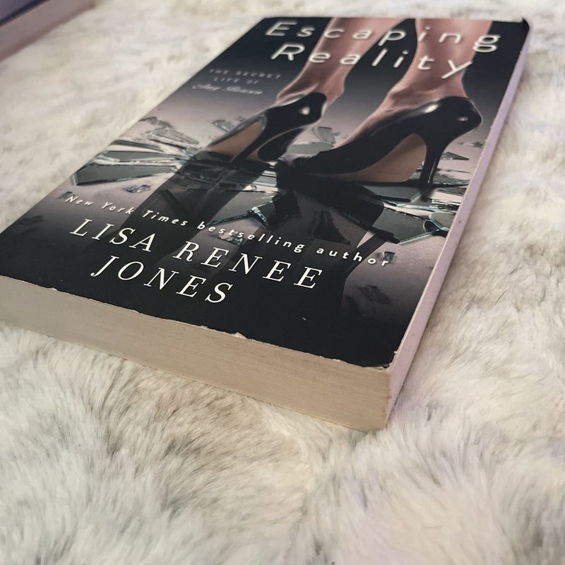 Escaping Reality by Lisa Renee Jones, Paperback | Pango Books