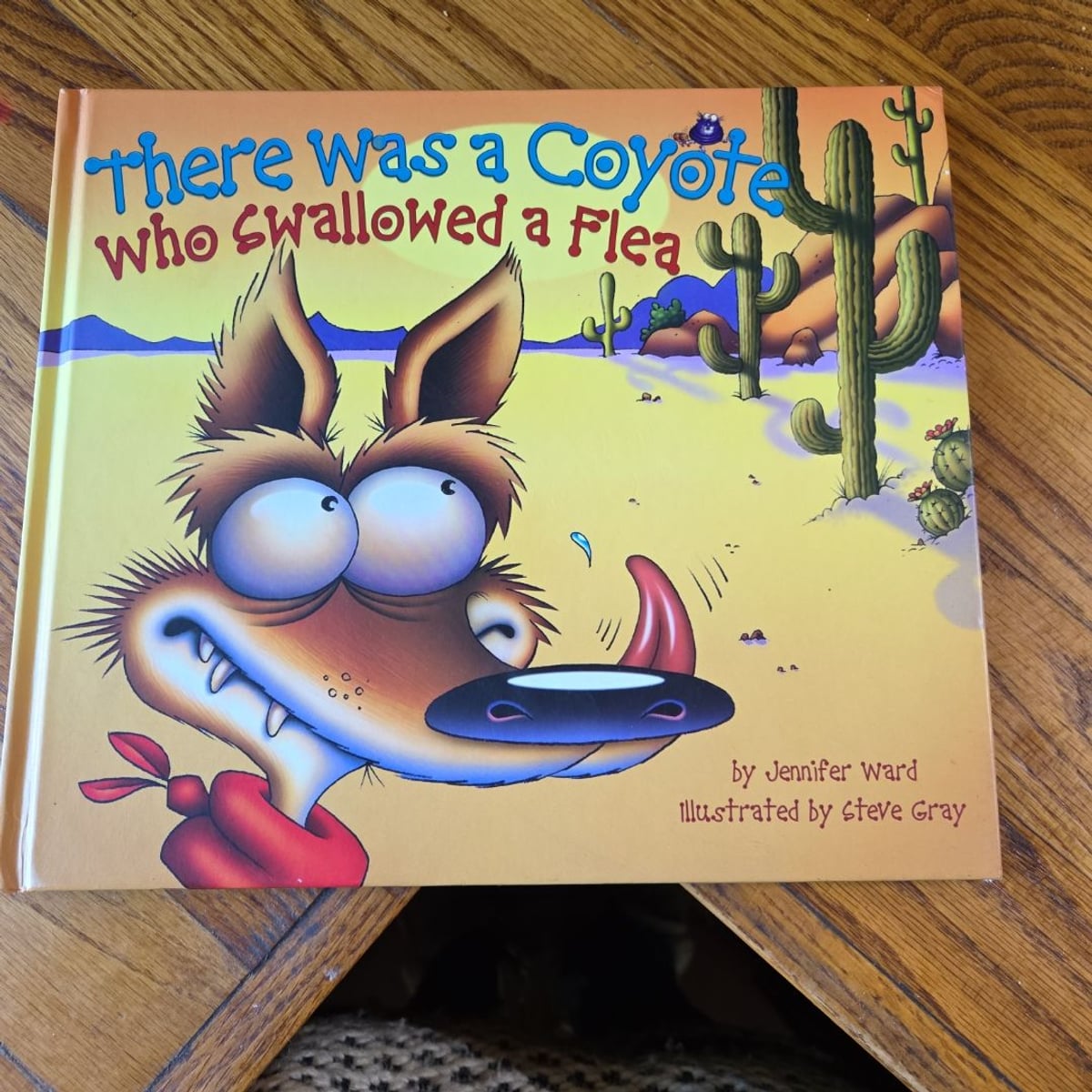 There Was a Coyote Who Swallowed a Flea by Jennifer Ward