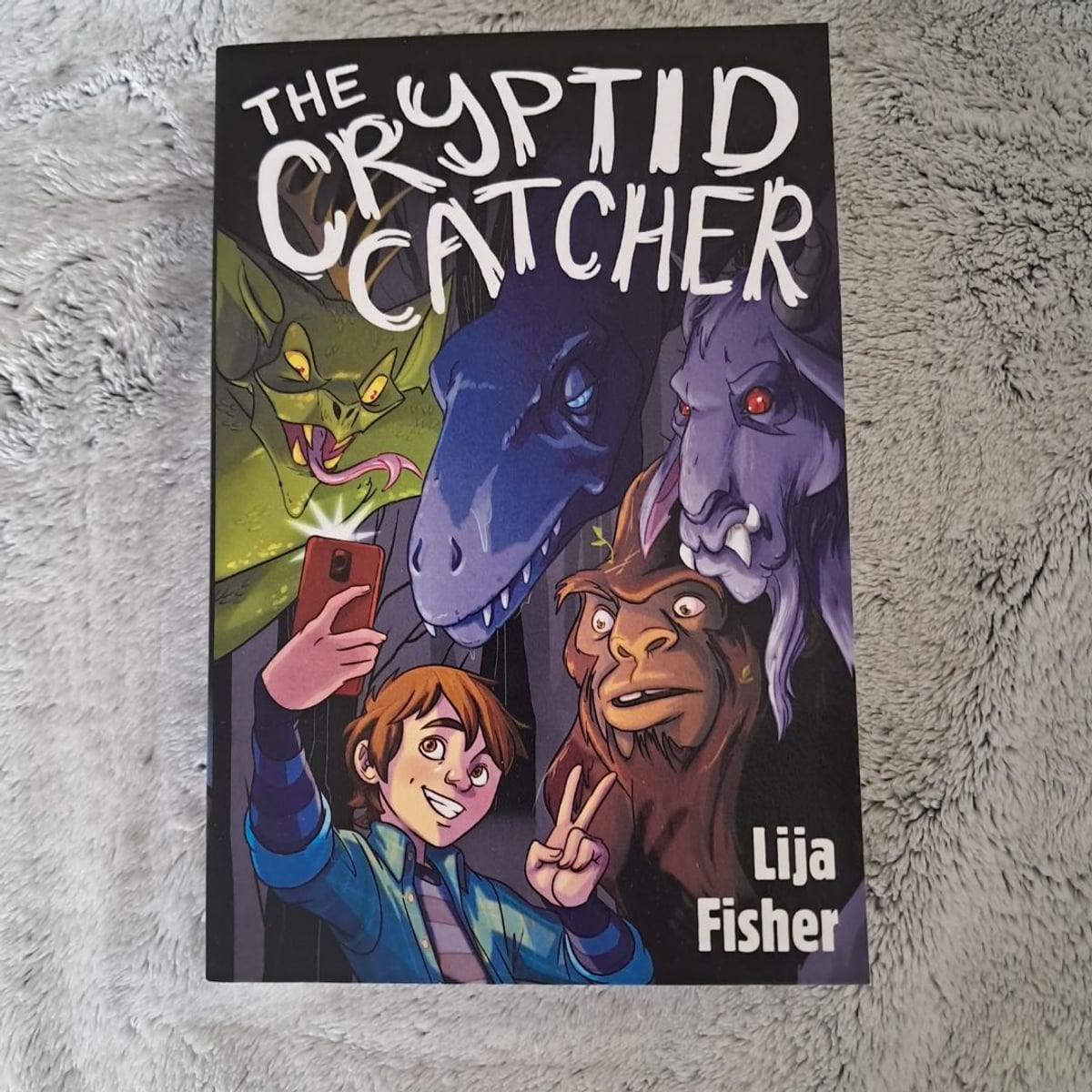 The Cryptid Catcher by Lija Fisher