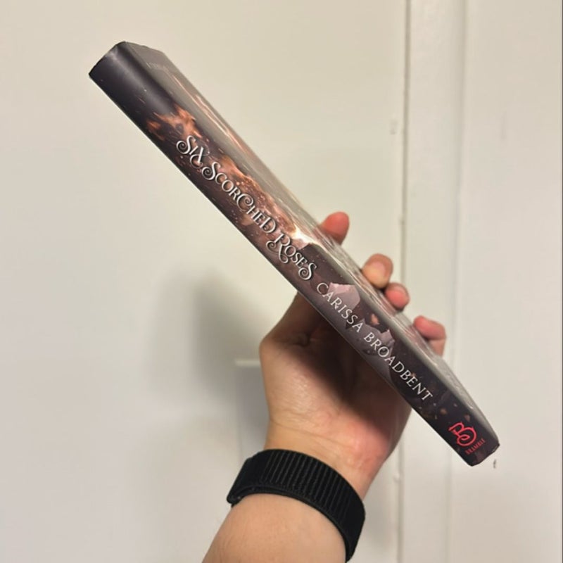 Six Scorched Roses by Carissa Broadbent