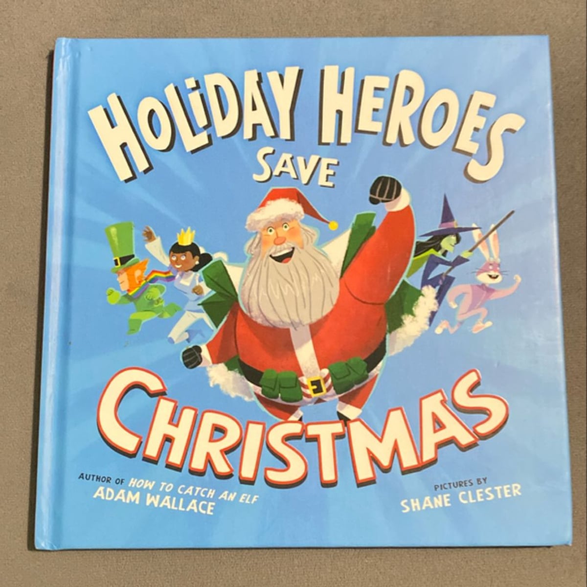 The Holiday Heroes Save Christmas by Adam Wallace