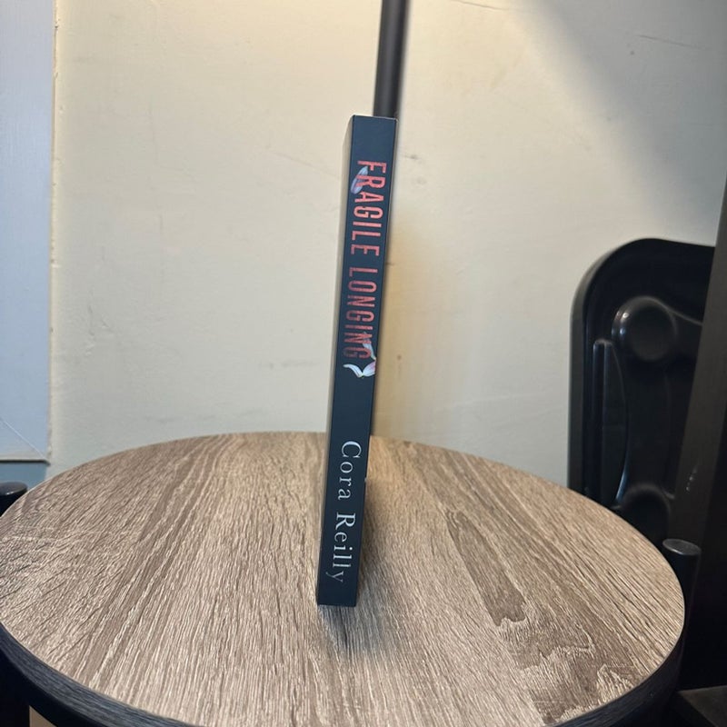 Fragile Longing by Cora Reilly, Paperback | Pangobooks