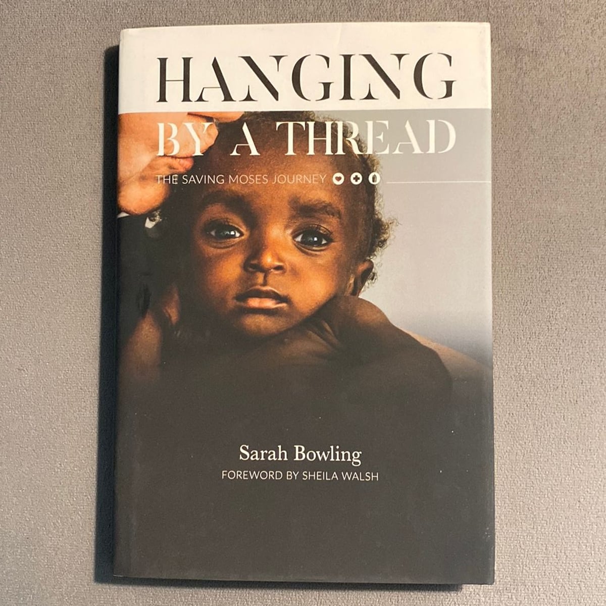 Hanging by a Thread by Sarah Bowling