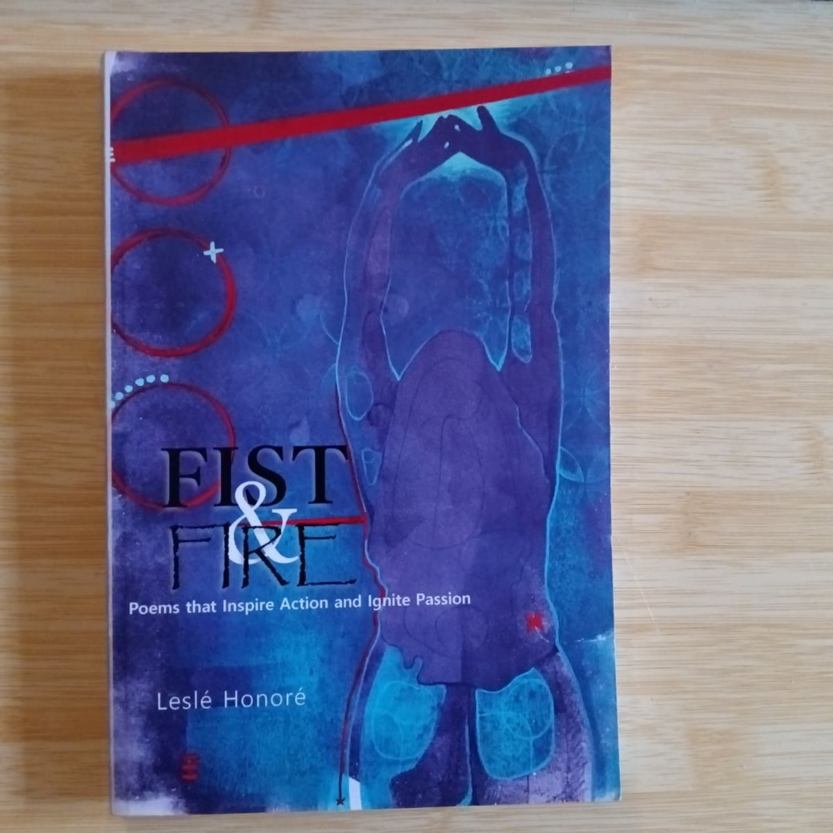 Fist and Fire by Lesle' Honore'