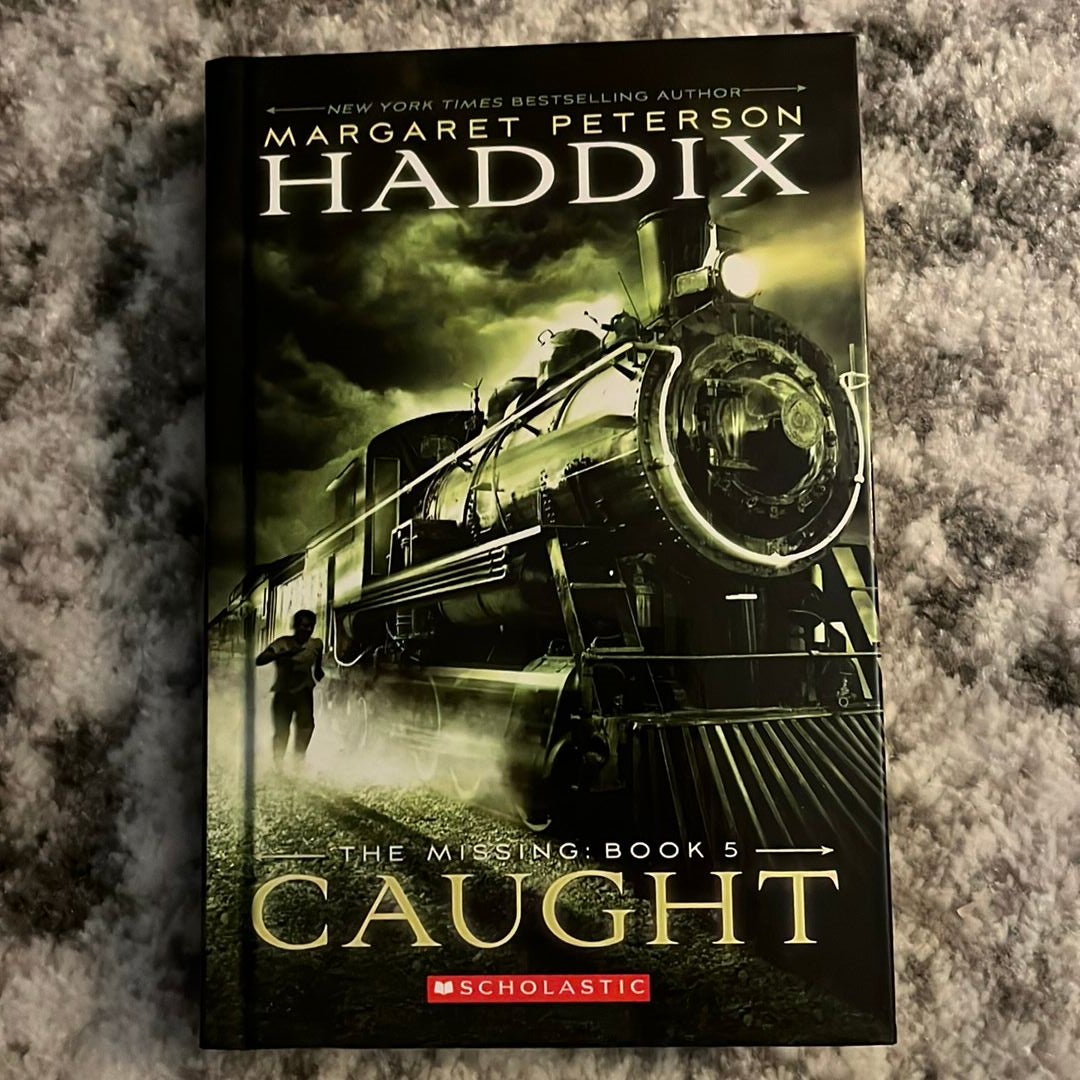 Caught by Margaret Peterson Haddix, Hardcover | Pangobooks
