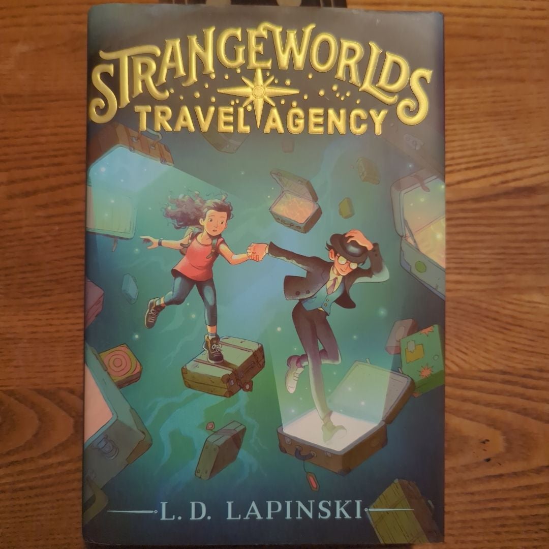 The Strangeworlds Travel Agency by L. D. Lapinski