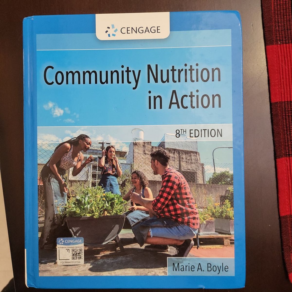 Community Nutrition in Action by Marie A. Boyle, Paperback | Pangobooks