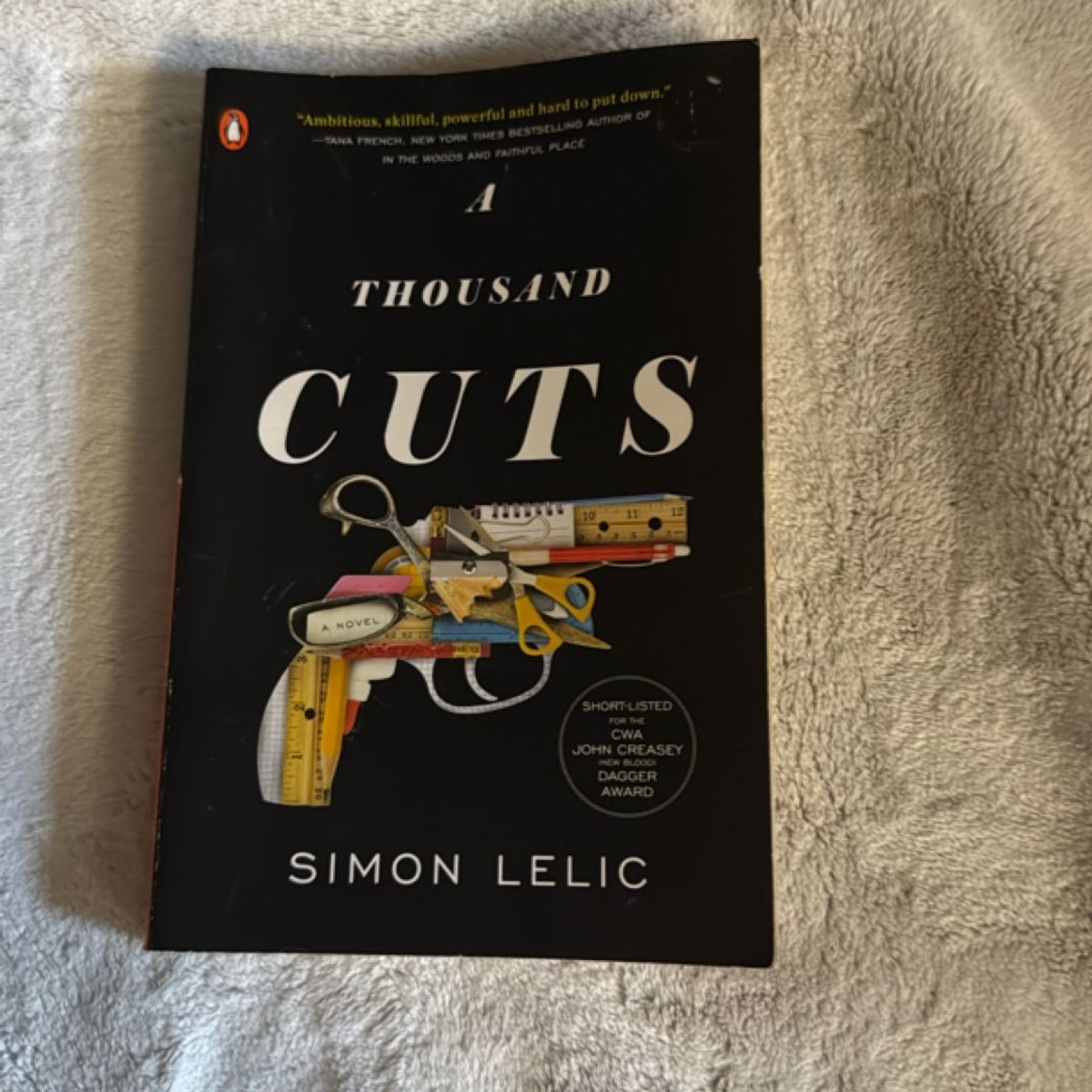 A Thousand Cuts by Simon Lelic