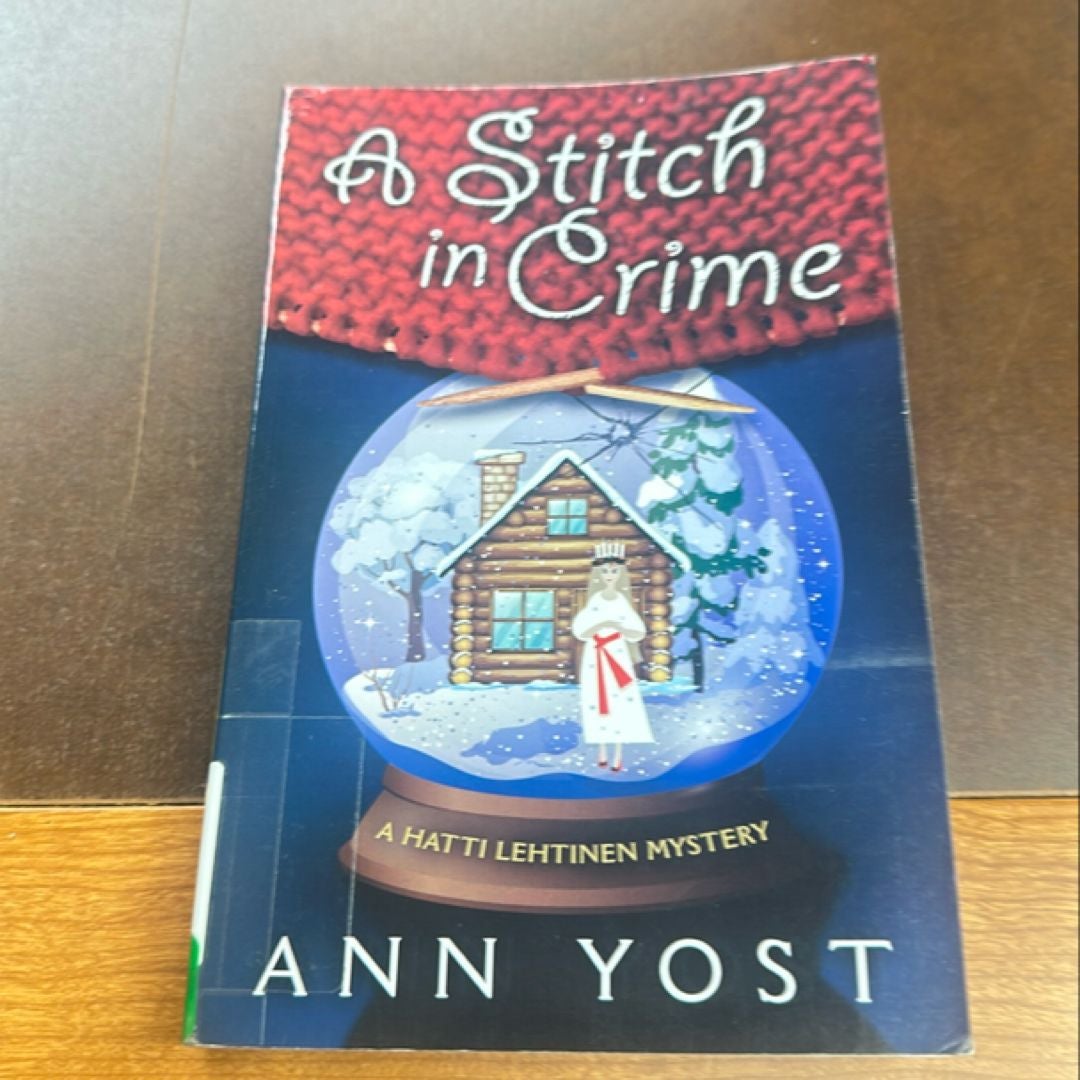 A Stitch in Crime by Ann Yost