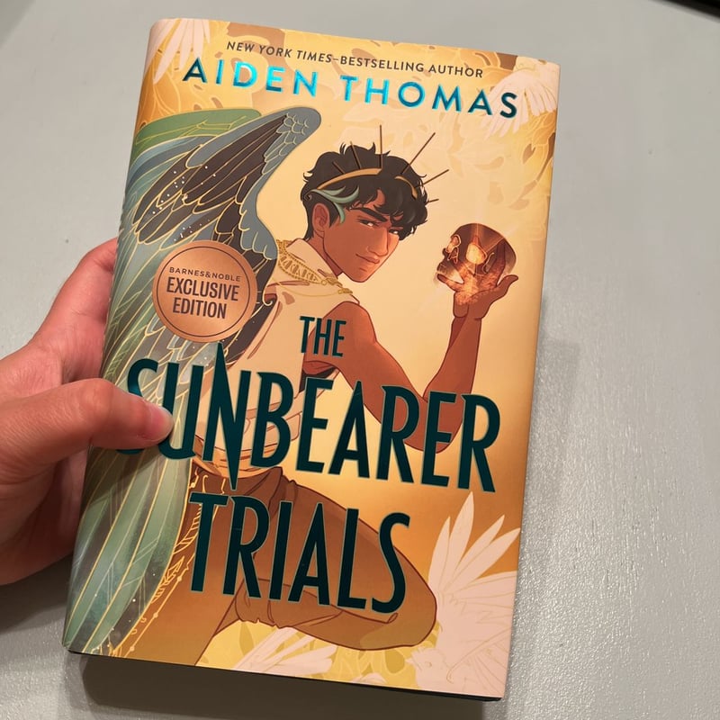 The Sunbearer Trials by Aiden Thomas, Hardcover | Pangobooks