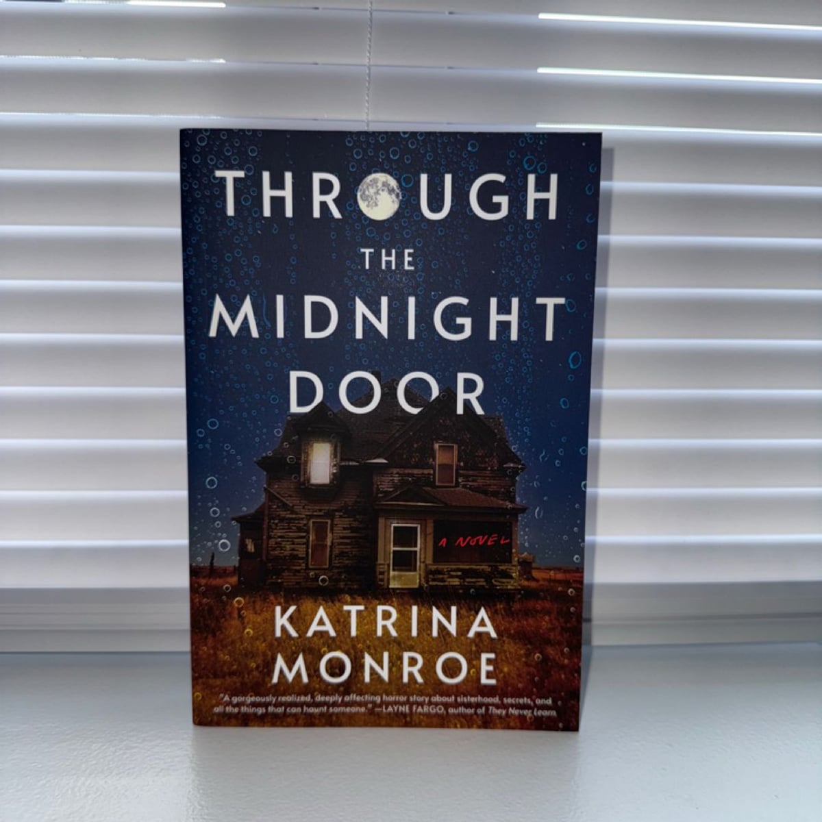 Through the Midnight Door by Katrina Monroe