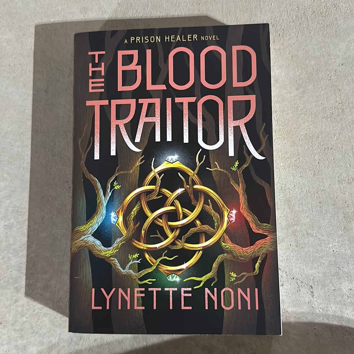 The Blood Traitor by Lynette Noni, Paperback | Pangobooks